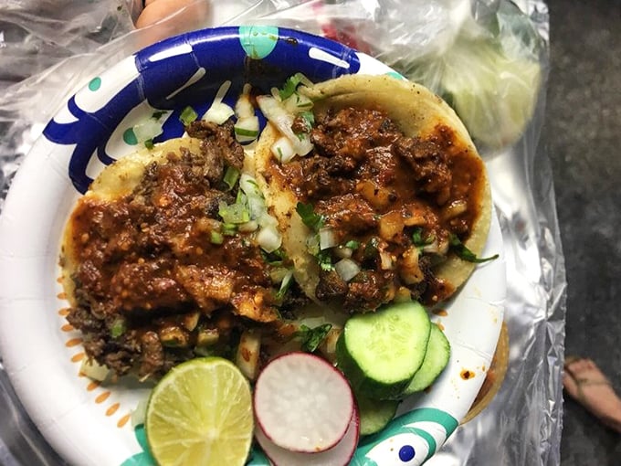 This isn't just a taco; it's edible architecture where each layer—meat, cilantro, onion—plays its essential, mouthwatering role.