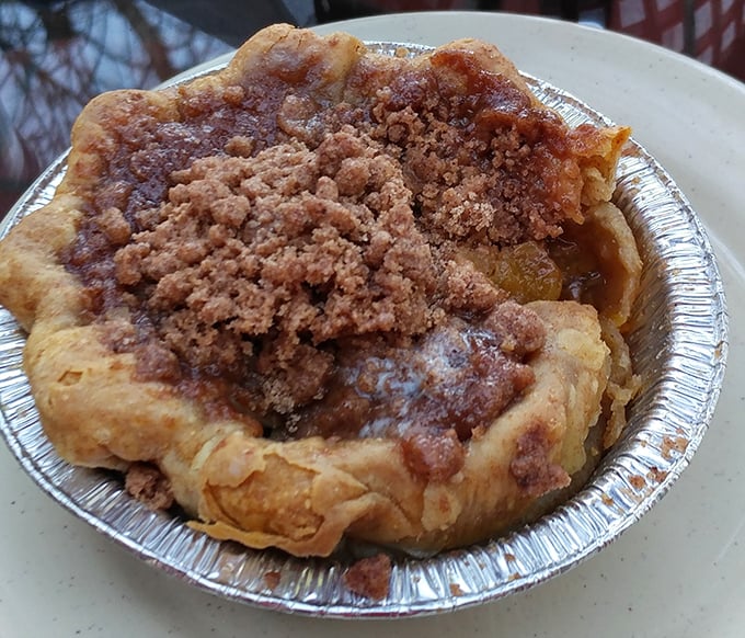 This isn't just apple cobbler – it's a warm hug in dessert form, with that perfect crumbly topping that your grandmother would approve of and secretly envy.
