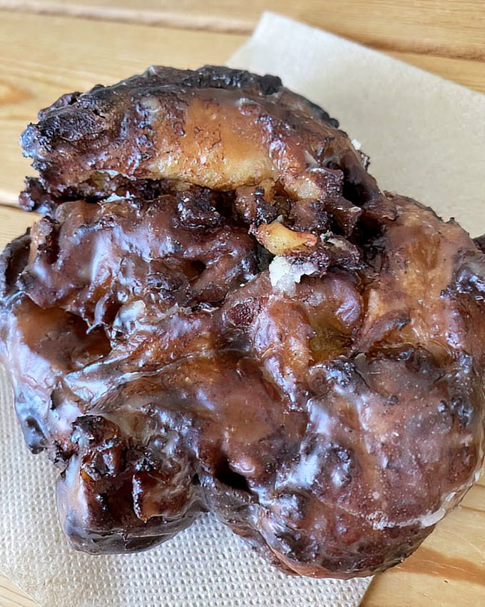 The apple fritter: a craggy, caramelized landscape of apple-studded dough that makes geologists and pastry lovers equally weak-kneed.