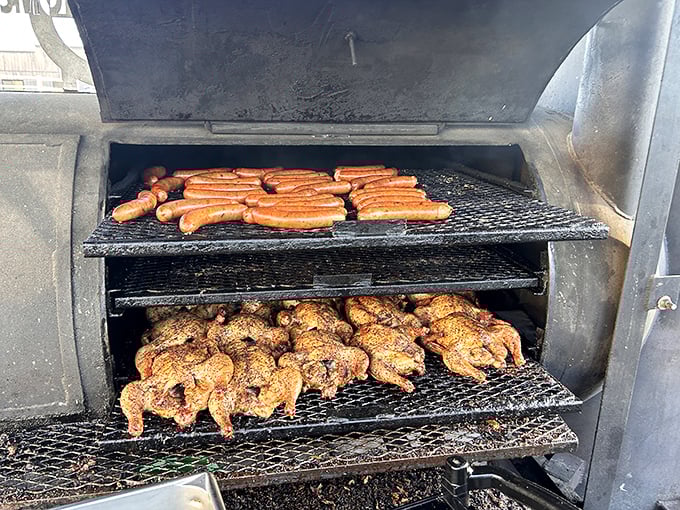 Behold the smoker in action – where sausages and chicken undergo their magical transformation from ordinary to extraordinary.