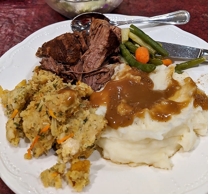 Slow-cooked roast beef that doesn't need a knife, mashed potatoes standing by for gravy duty, and vegetables that didn't come from a freezer bag. 