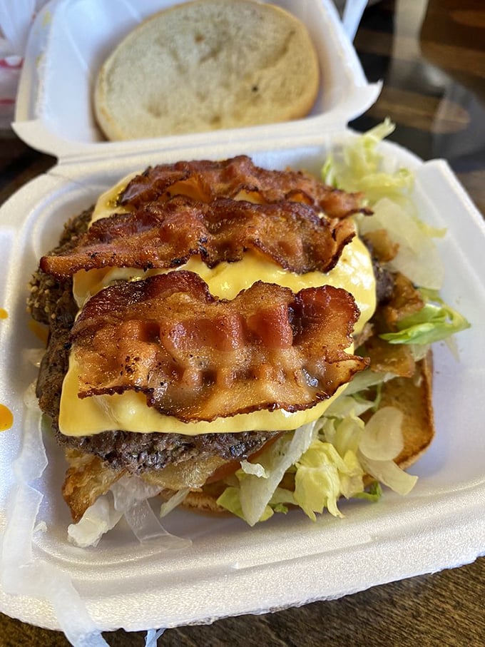 This bacon cheeseburger doesn't need fancy plating to impress—just perfectly crisp bacon, melty cheese, and a patty that makes you momentarily forget your table manners.