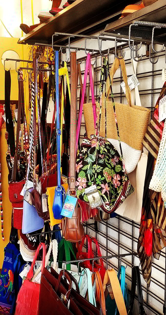 Handbag heaven! A colorful cascade of purses, totes, and clutches waiting to be rescued from singledom and matched with their forever owner.