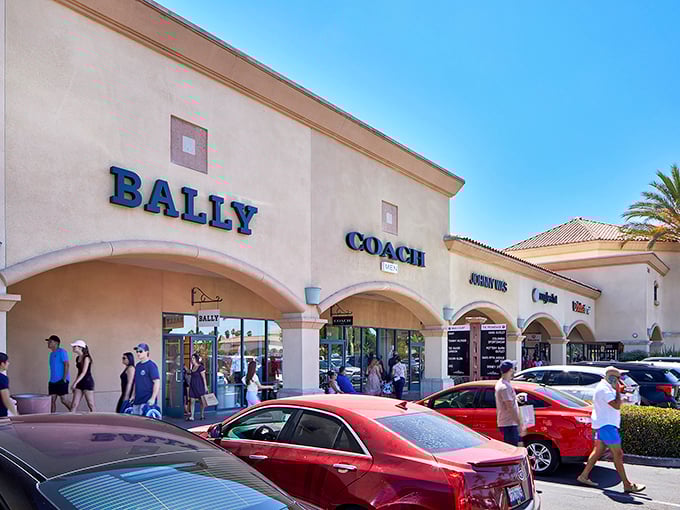 Luxury row's heavy hitters—Bally, Coach, and Juicy Couture—stand shoulder to shoulder like old Hollywood stars at a premiere of "Savings: The Sequel."