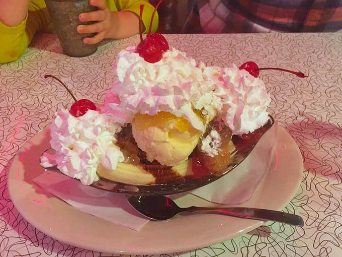 Not just a banana split—it's an architectural marvel of ice cream, whipped cream, and cherries that requires engineering skills to eat.