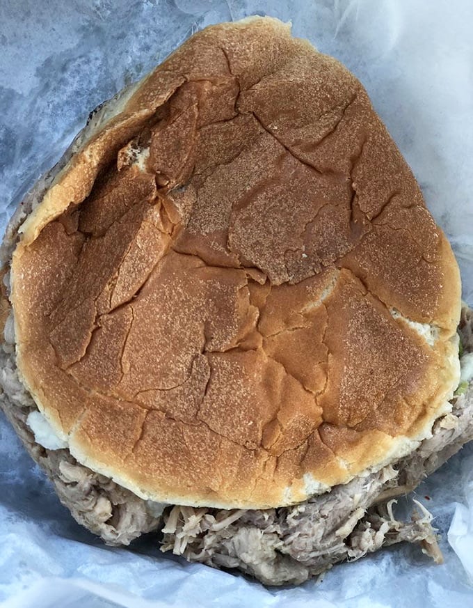 The legendary B's sandwich—a humble throne of chopped pork on a soft bun. Architecture this perfect makes the Taj Mahal seem a bit showy by comparison.