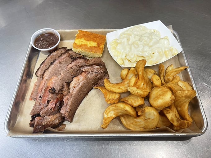 Brisket so tender it practically surrenders at the sight of your fork. That smoke ring is the barbecue equivalent of a Michelin star.