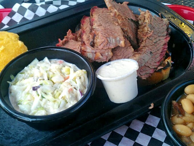 Brisket that doesn't need a knife—just a willing appetite. The pink smoke ring is the BBQ equivalent of a Michelin star.