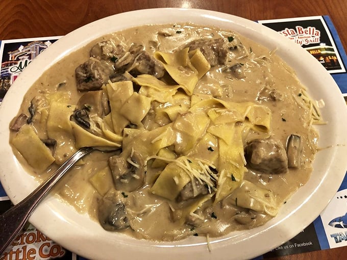 Behold the beef stroganoff in all its glory – tender meat and mushrooms swimming in a sauce so rich it probably has its own investment portfolio.