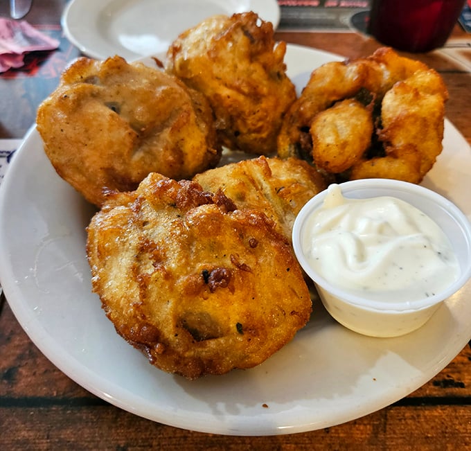 Golden-fried mushrooms that crunch like autumn leaves—a simple pleasure that proves bar food can be an art form when done right.