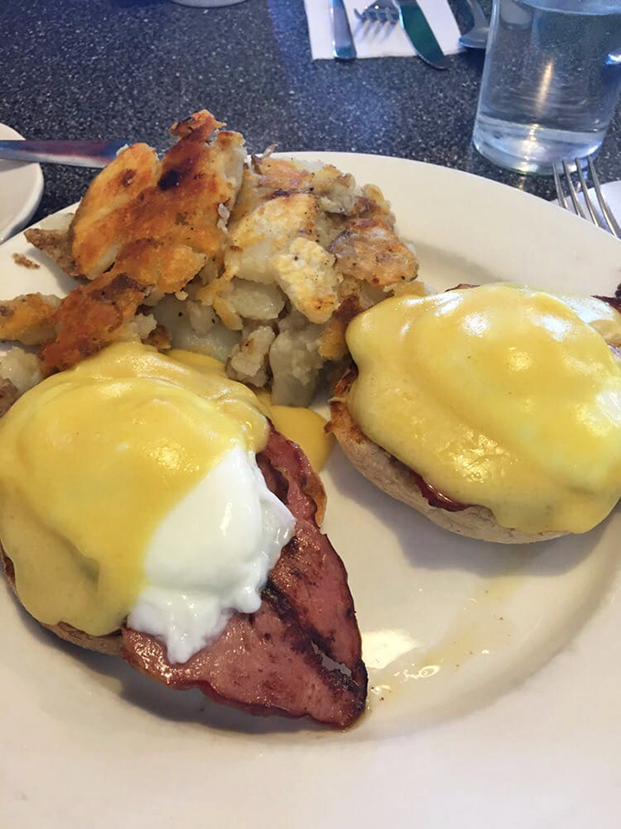 Eggs Benedict at Kuppy's doesn't need fancy presentation—just perfectly poached eggs, Canadian bacon, and hollandaise sauce that would make a French chef nod in approval.