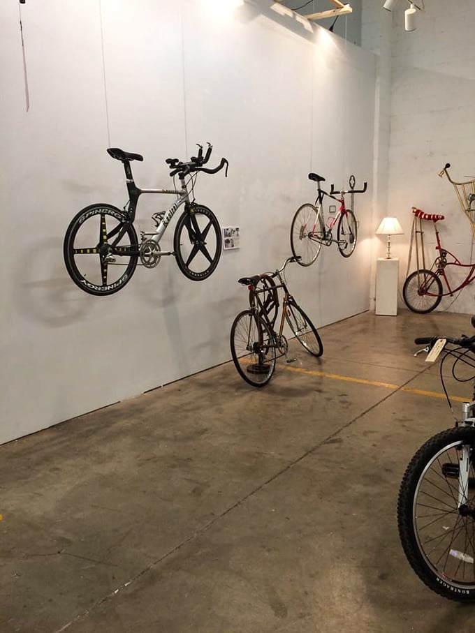 Who knew a bicycle gallery could be so mesmerizing? These two-wheeled treasures hang like industrial art installations waiting for their next adventure.
