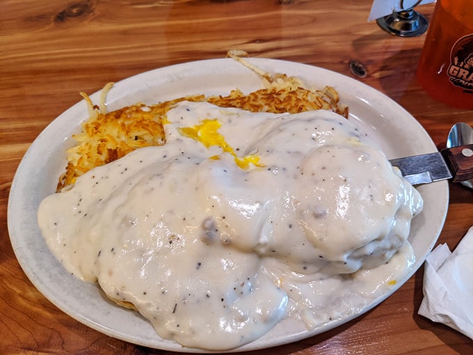 Behold the holy grail of comfort food: biscuits and gravy so generous they're practically wearing a "Go Big or Go Home" t-shirt.