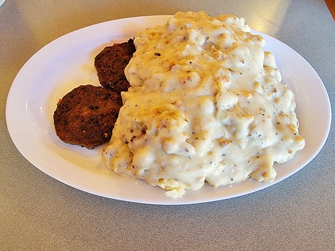 This isn't just biscuits and gravy – it's a cloud of creamy, peppery heaven that makes you question all other breakfast choices.