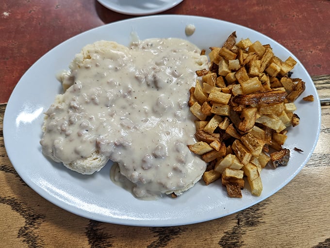 Behold the star attraction: Gigi's legendary biscuits and gravy alongside perfectly crisped homefries. This plate has launched a thousand food pilgrimages.