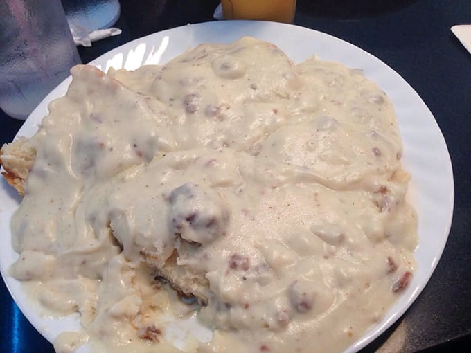 Behold the legendary biscuits and gravy—a creamy, peppery blanket of sausage-studded heaven that locals would cross county lines to enjoy.