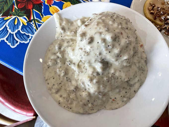 Behold the legendary biscuits and gravy—a mountain of peppery, sausage-studded cream sauce that's converted more food skeptics than a televangelist on Sunday morning.