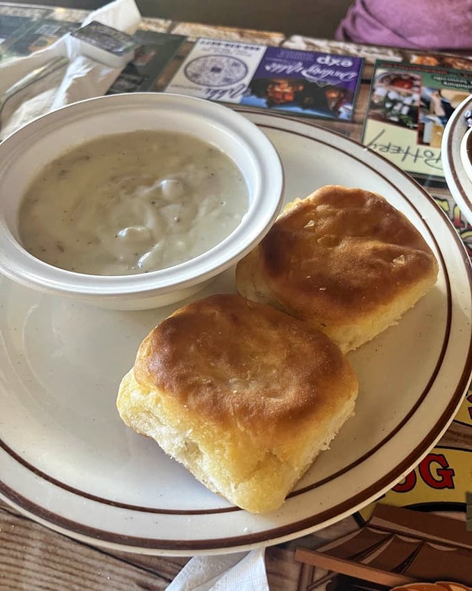 Behold the stars of our show! These golden biscuits with creamy sausage gravy aren't just breakfast—they're an edible love letter to Southern cooking traditions.