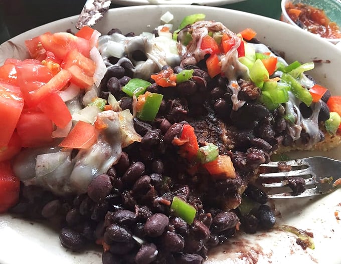 These black bean corn cakes aren't just vegetarian fare—they're a textural masterpiece where crispy edges meet creamy centers in perfect harmony.