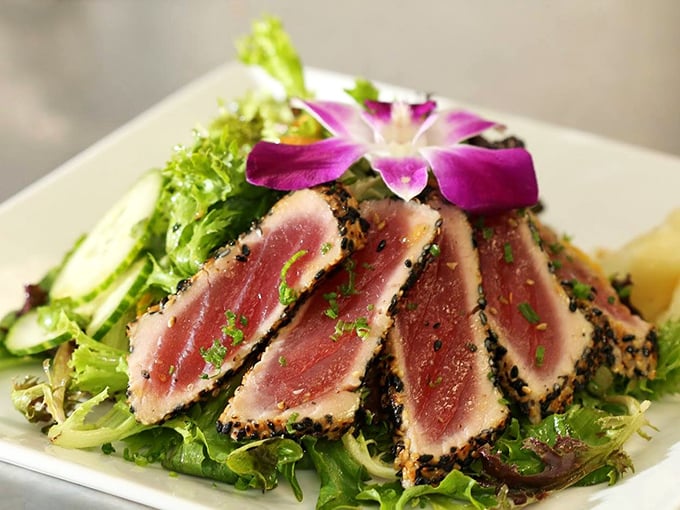 Blackened Ahi Tuna that's barely kissed the heat – the seafood equivalent of showing up fashionably late to a party. 