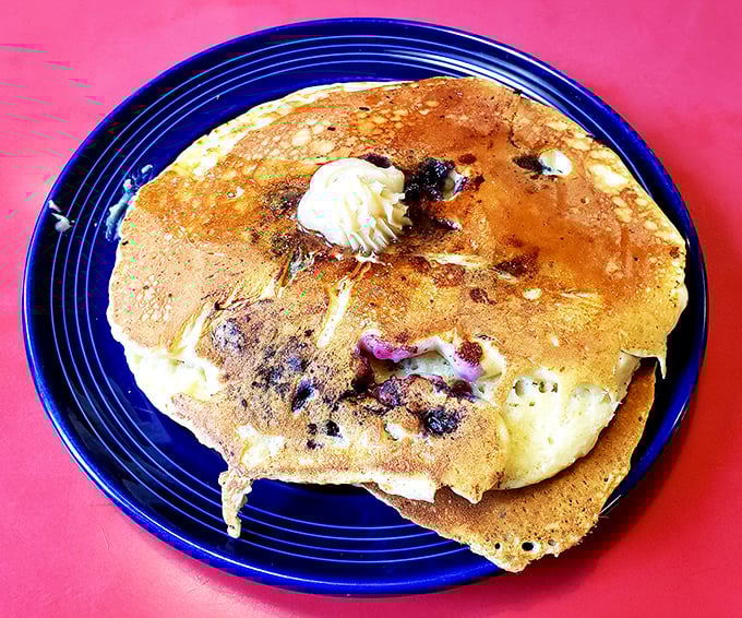 These blueberry pancakes aren't just breakfast, they're an edible postcard from heaven with butter melting into every nook.