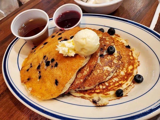 Behold: pancake perfection. Those blueberries aren't just tossed in—they're strategically deployed for maximum flavor impact in every heavenly bite.