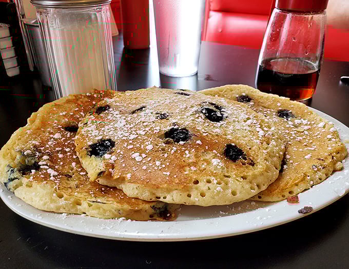 Blueberry pancakes that don't just look good for Instagram—they're the kind that make you close your eyes and forget you're in public.