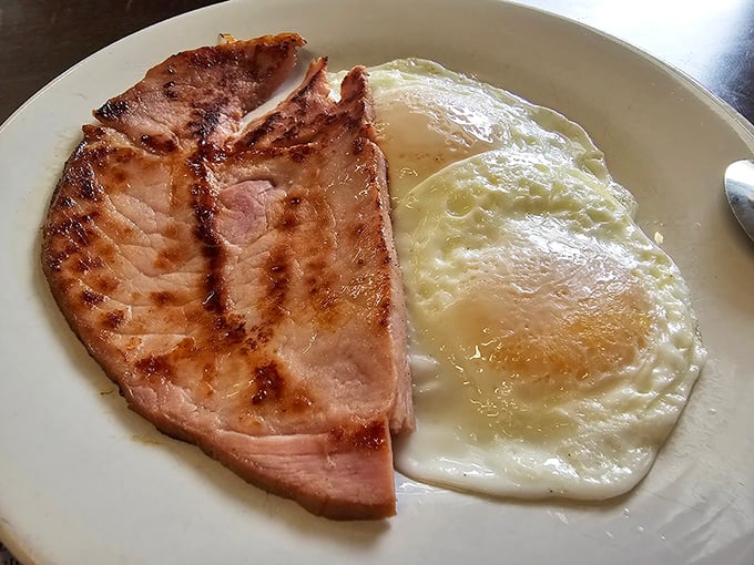 Country ham and eggs—the breakfast equivalent of a perfect dance partner. Simple, elegant, and exactly what you need to start the day right.