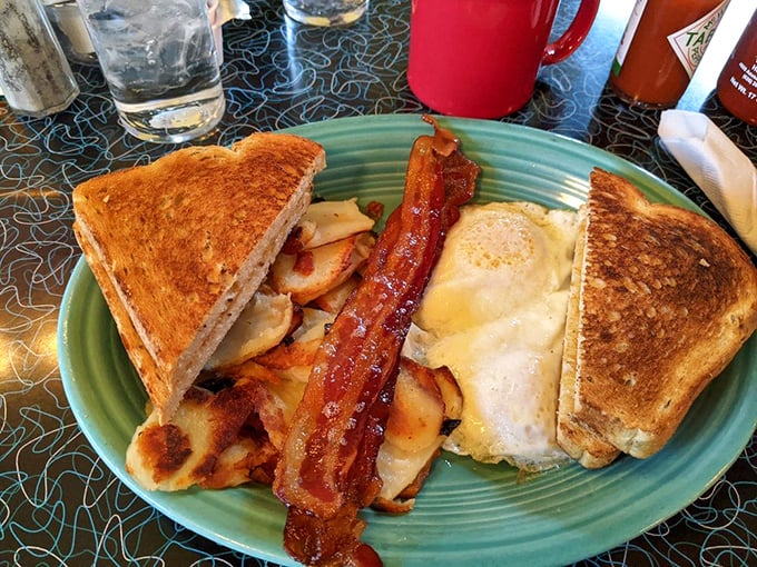 The breakfast trinity—perfectly toasted bread, crispy home fries, and bacon that strikes that magical balance between chewy and crisp. Breakfast nirvana achieved.