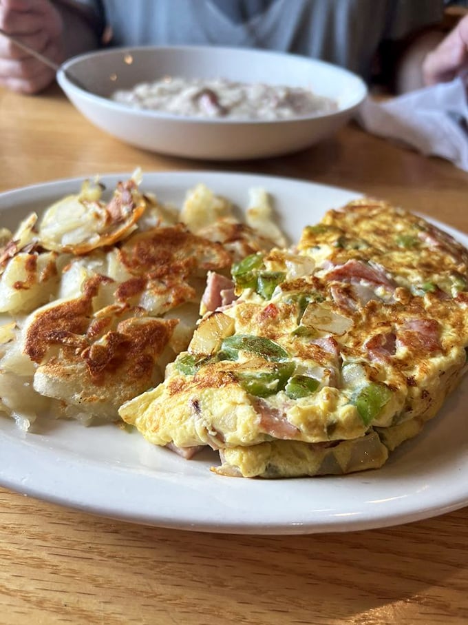 This Western omelet doesn't need Instagram filters to look good – it's the real deal, with home fries that could make a potato farmer weep with pride.