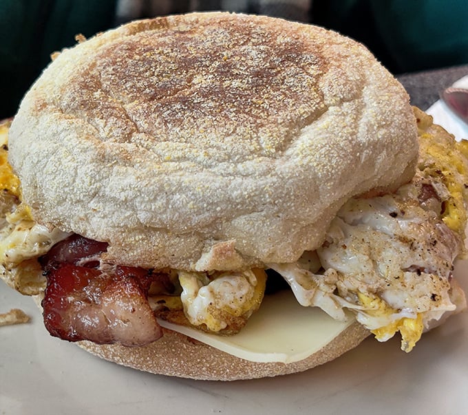 Breakfast sandwich perfection doesn't need fancy ingredients—just eggs with character, bacon with attitude, and an English muffin that knows its role.