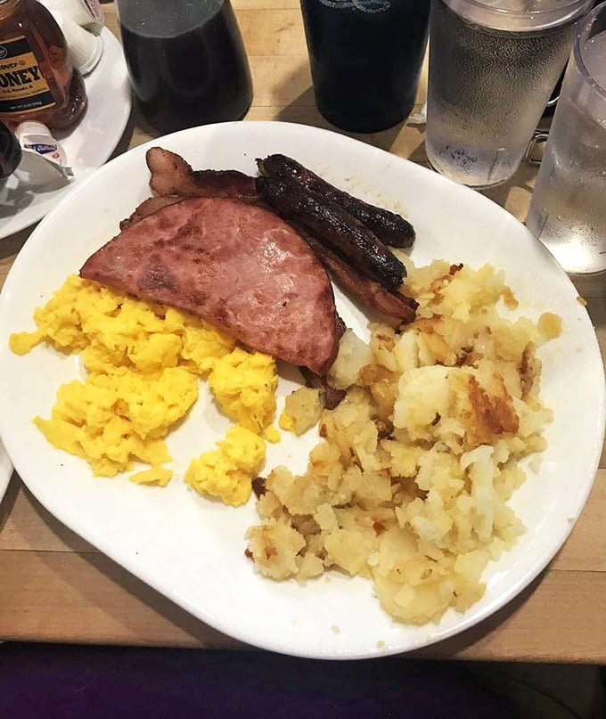 Breakfast of champions! Perfectly scrambled eggs, ham steak, and hash browns that could convert even the most dedicated breakfast skeptic.