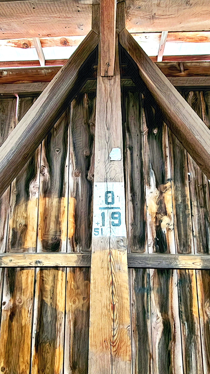 Historical markings inside reveal the bridge's age—like tree rings in wooden form, documenting decades of travelers passing through.