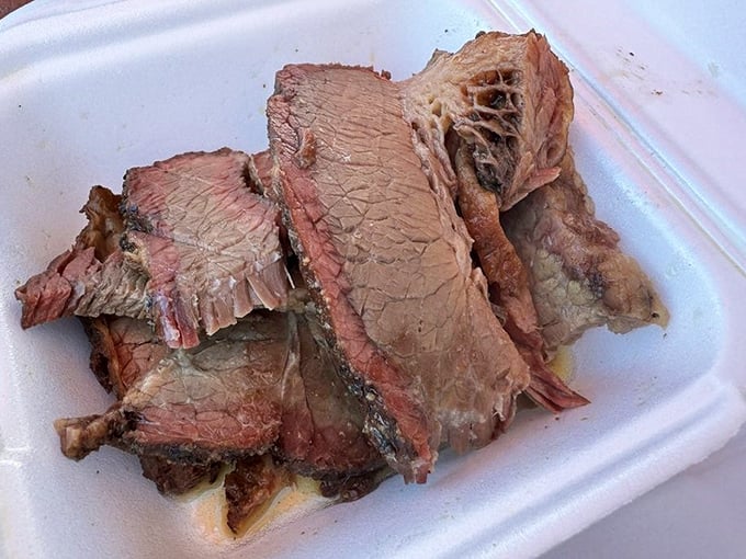 Brisket with that telltale pink smoke ring—the barbecue equivalent of finding the Hope Diamond in a strip mall in Lemon Grove.