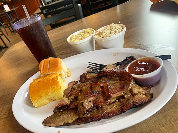 Brisket that doesn't just melt in your mouth—it starts a party there. Served with cornbread and sides that know their supporting role.