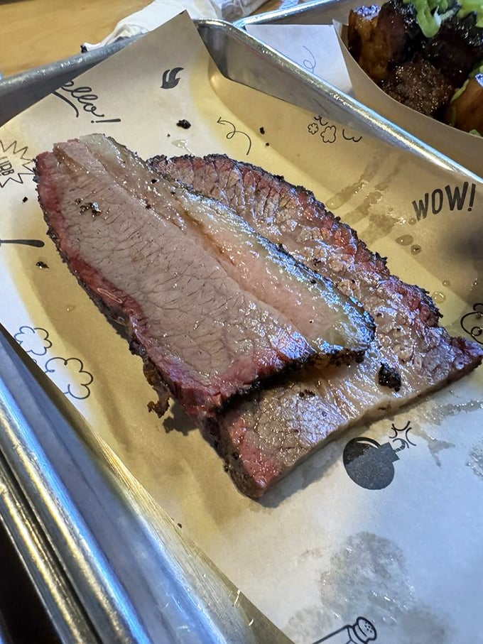 Brisket so perfectly rendered it practically poses for its glamour shot – that smoke ring is the barbecue equivalent of a designer label.