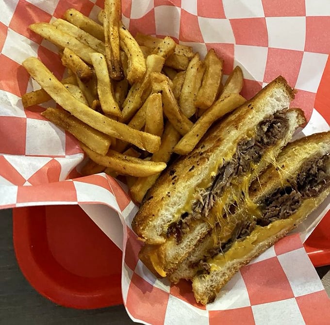 Behold the brisket grilled cheese – proof that some sandwiches deserve their own holiday and parade float.