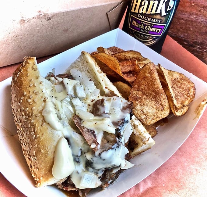 This isn't just a sandwich – it's a brisket revelation with melty cheese and house-made chips that'll haunt your dreams.