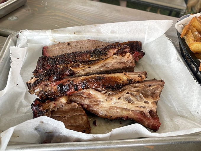 Behold the pink smoke ring of glory – this brisket has more layers than a Shakespearean drama.