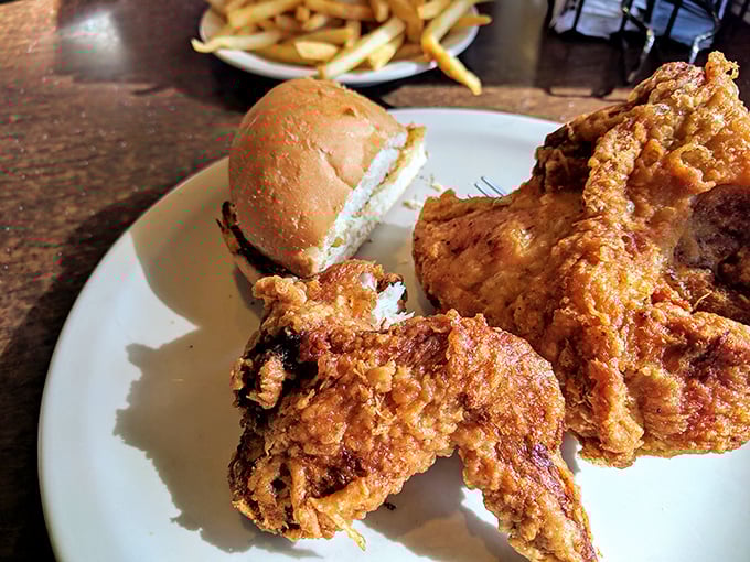 Golden-brown perfection that makes you understand why people drive for miles – broasted chicken that's crispy outside, juicy inside.