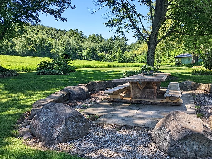 A stone table surrounded by boulders—nature's conference room. The perfect spot to contemplate life's big questions or simply enjoy a sandwich with a view.