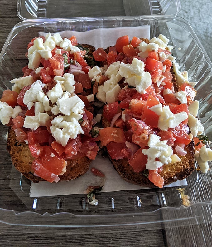 Behold the bruschetta that launched a thousand return trips—crispy bread, fresh tomatoes, and crumbled cheese in perfect harmony.