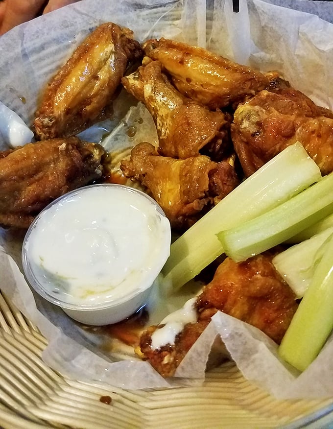 Buffalo wings that would make Buffalo jealous. Crispy, saucy perfection served with the obligatory celery and blue cheese—a seafood joint's surprising superstar.