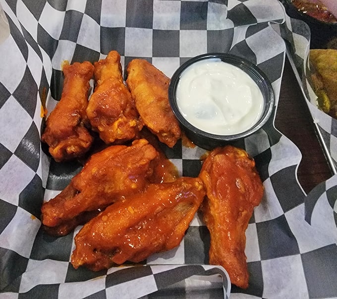 Buffalo wings that don't mess around—crispy, saucy, and unapologetically messy. Your shirt will remember this meal long after your stomach does.