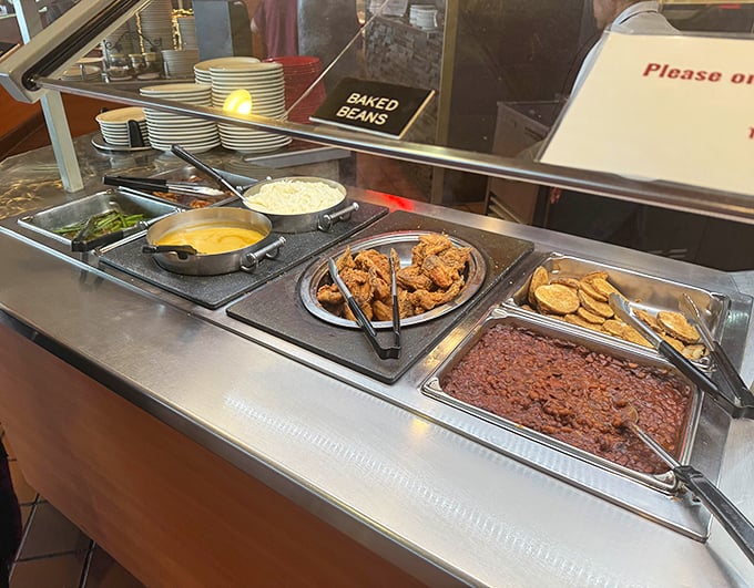 Classic comfort foods line the buffet – those baked beans have clearly been simmering since before you made your weekend plans.