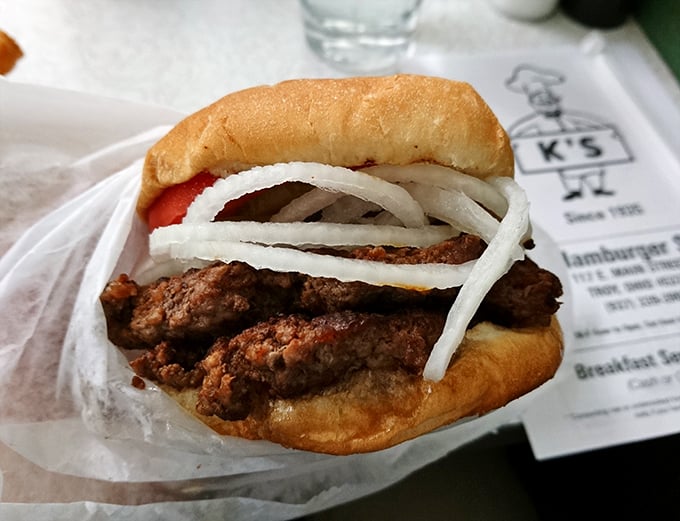 This isn't just a burger—it's edible history. Hand-formed patty, fresh onions, and a bun that's been toasted with respect, not rushed.