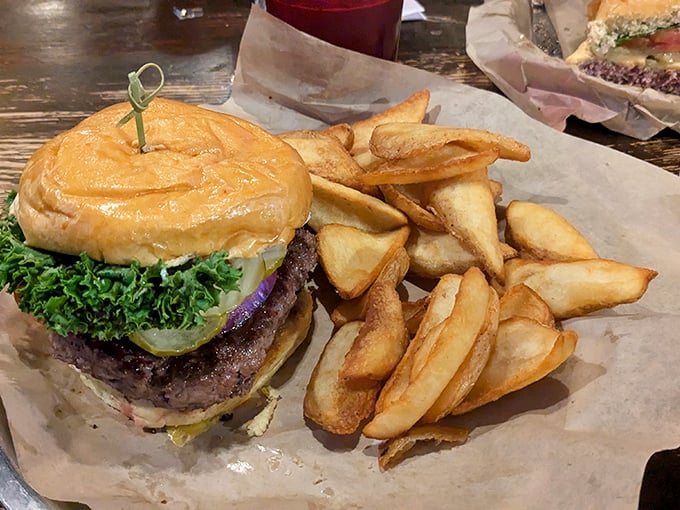 This isn't just a burger—it's a masterpiece of beef architecture, where every layer from the toasted bun to the fresh toppings plays its part perfectly.