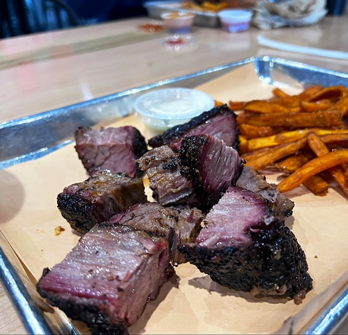 Burnt ends – the barbecue equivalent of striking gold. These caramelized brisket nuggets deliver a perfect symphony of bark, smoke, and melt-in-your-mouth beefiness.
