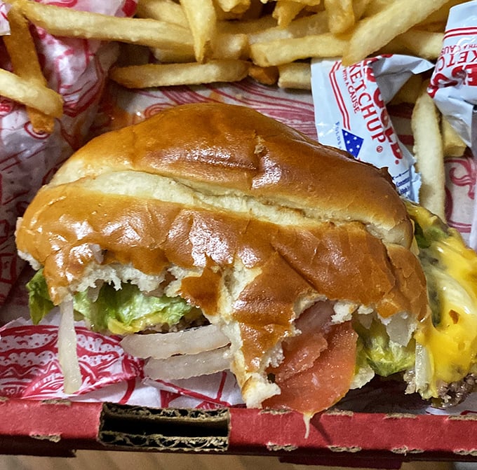 This isn't just a cheeseburger; it's a masterclass in simplicity done perfectly – the kind that makes you question why you ever ordered anything else.