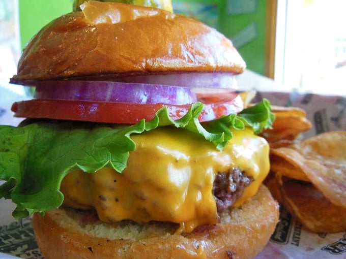 Cheese cascading down a perfectly cooked patty like a yellow waterfall of flavor—this is burger architecture at its finest.